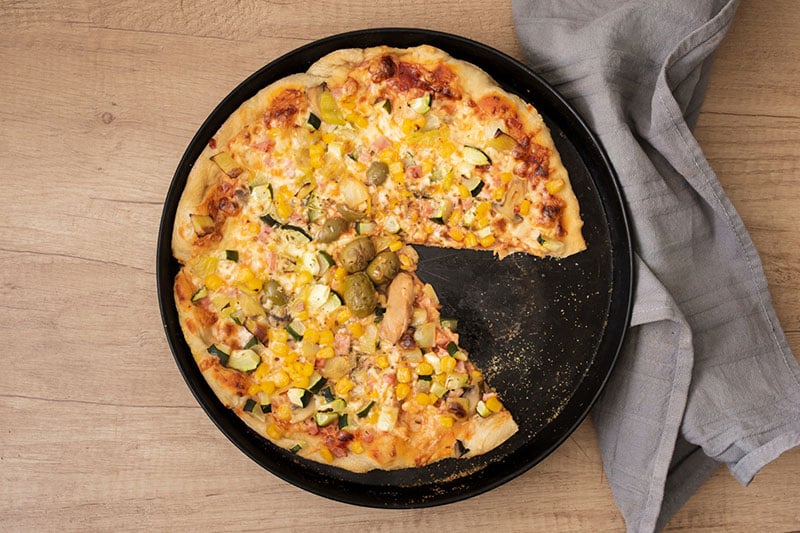 Pizza Stone vs Cast Iron: Which Is Better For Homemade Pizza? (ANSWERED!)